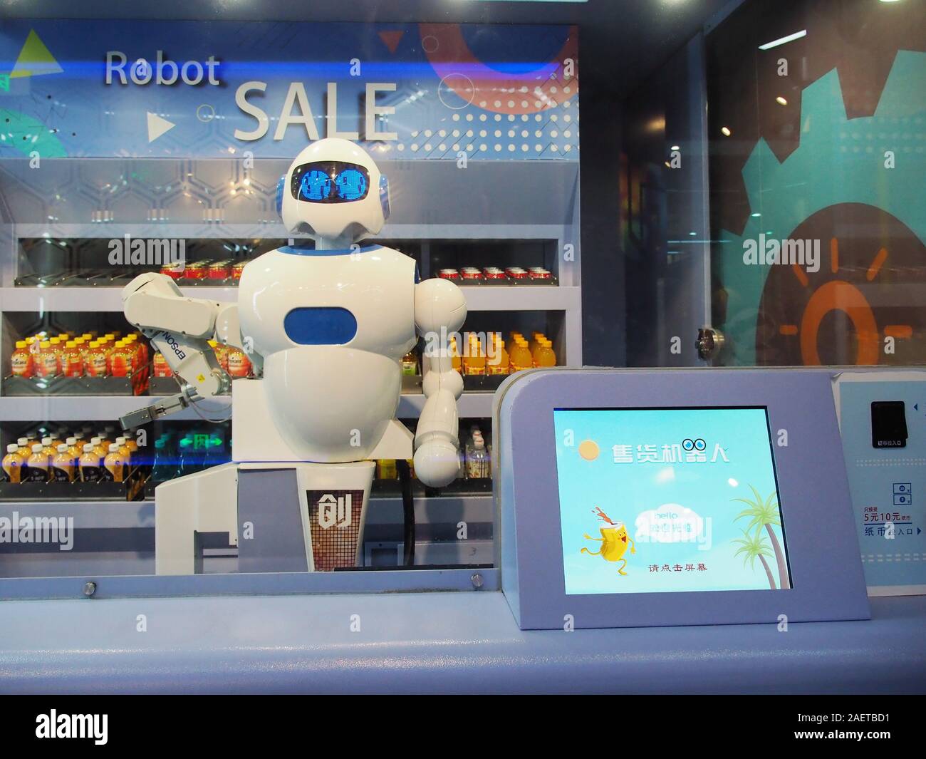 A robot sells drinks at a Robot Sale vendor stall at the China Soong ...