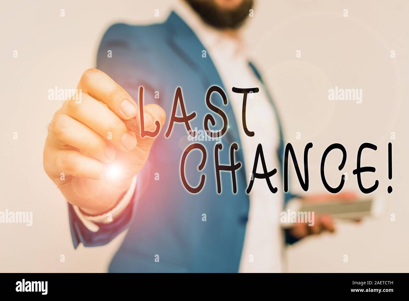 Writing note showing Last Chance. Business concept for final ...