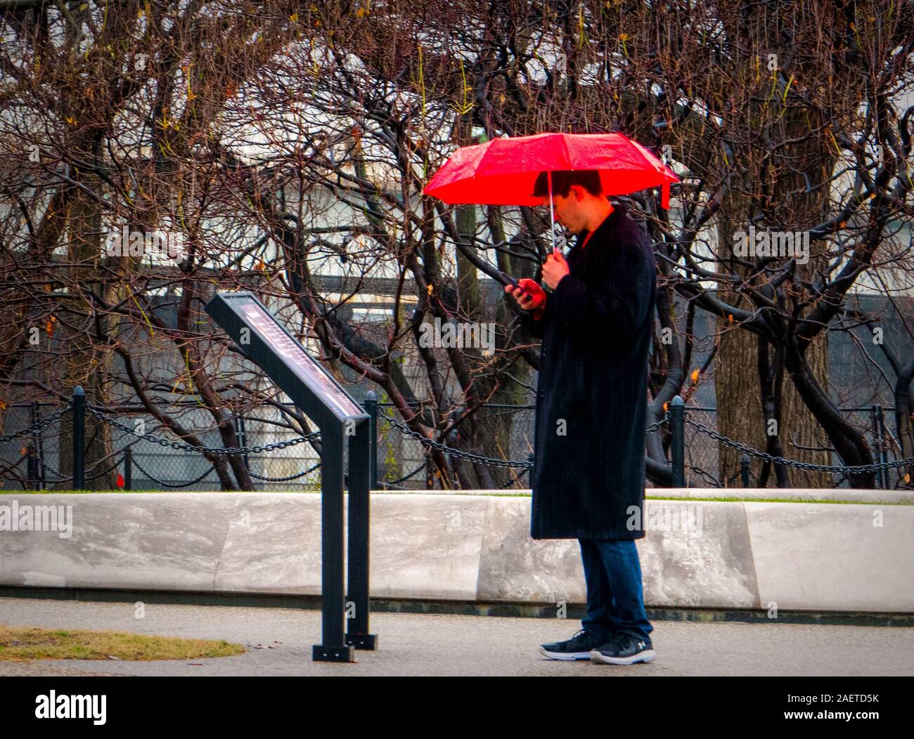 Man with brolly hi-res stock photography and images - Alamy