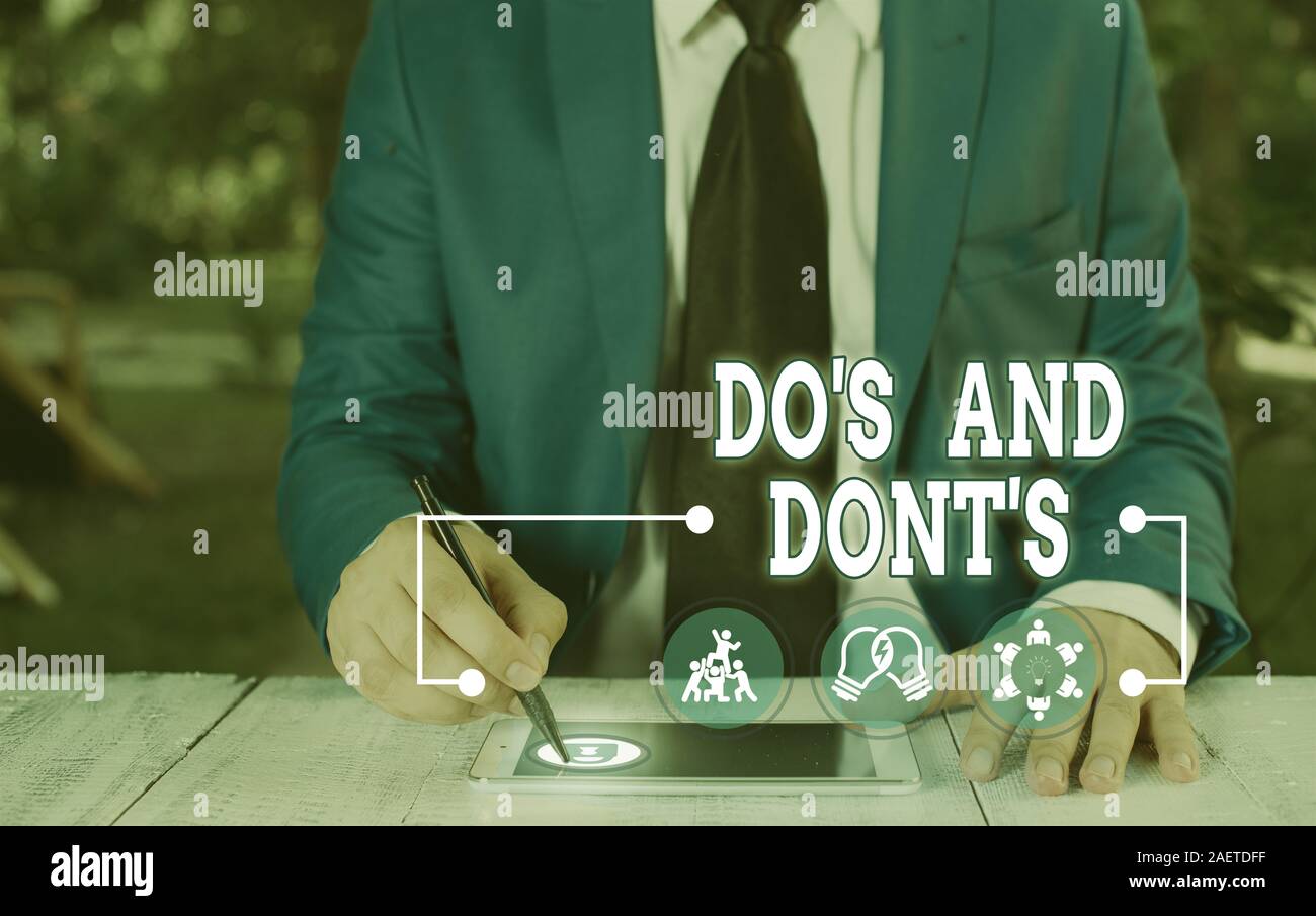 Conceptual hand writing showing Do S And Dont S. Concept meaning Rules ...