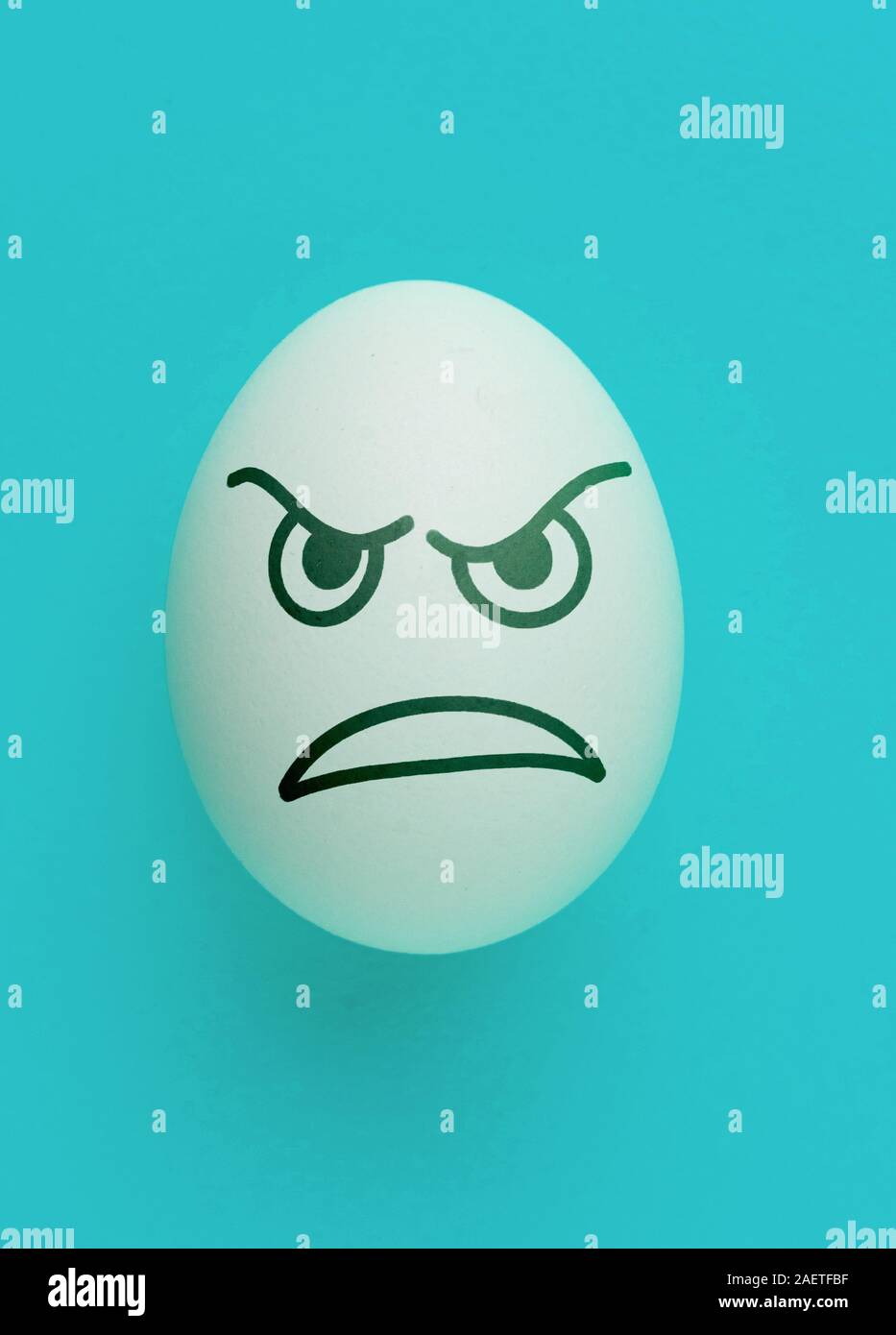 the evil scary angry face emotion painted on the easter egg, halloween ...