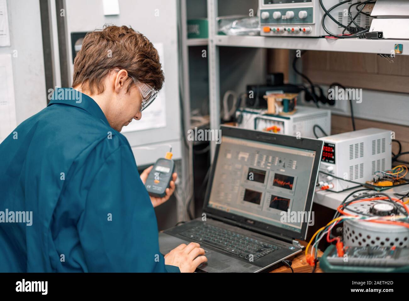 engineer employee working process on the machine factory Stock Photo ...
