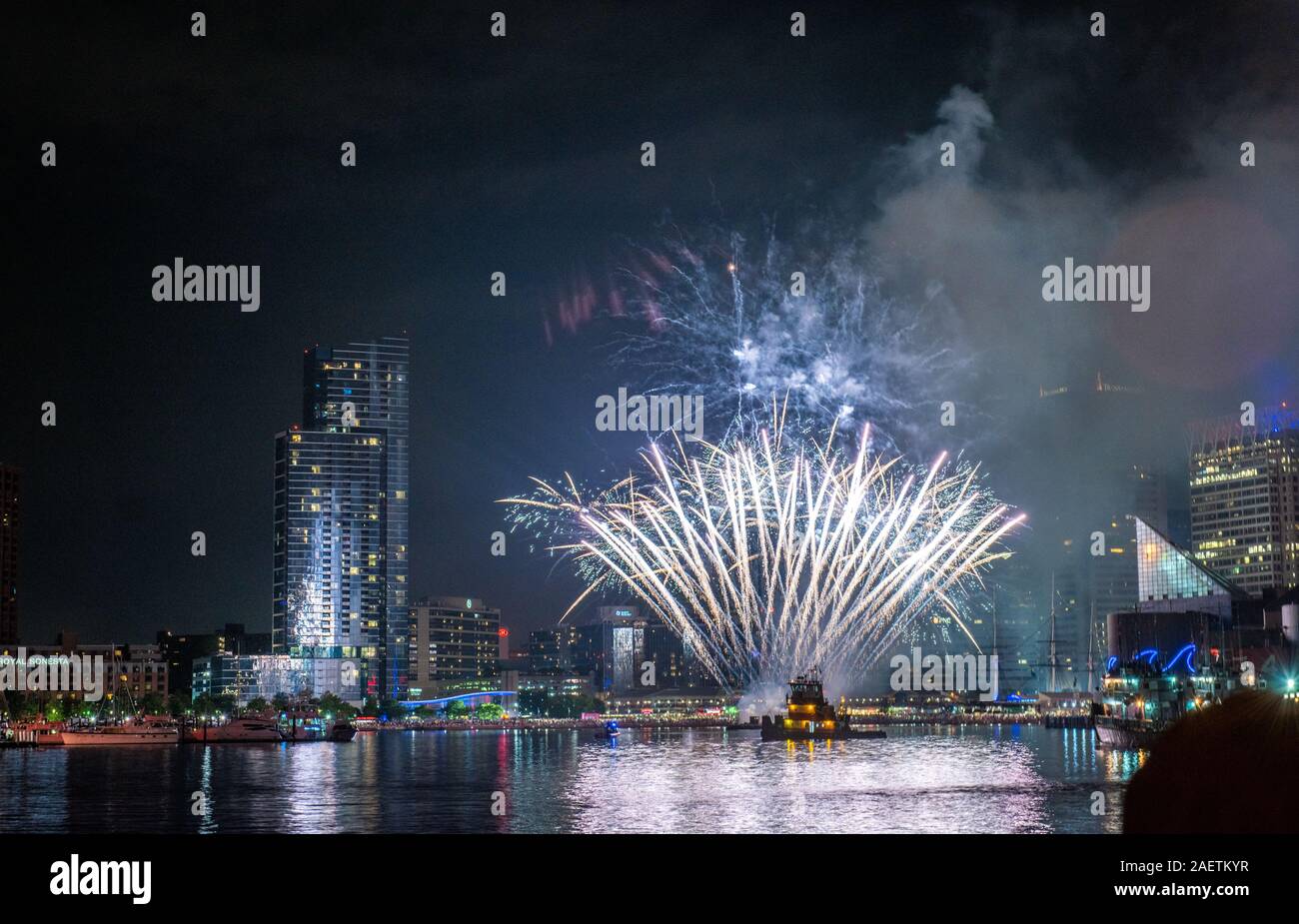 Colorful fireworks light up the night sky over Baltimore's inner harbor ...