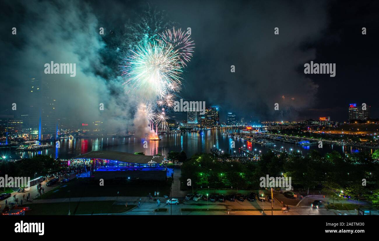 Colorful fireworks light up the night sky over Baltimore's inner harbor ...