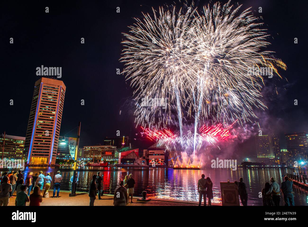 Colorful fireworks light up the night sky over Baltimore's inner harbor ...