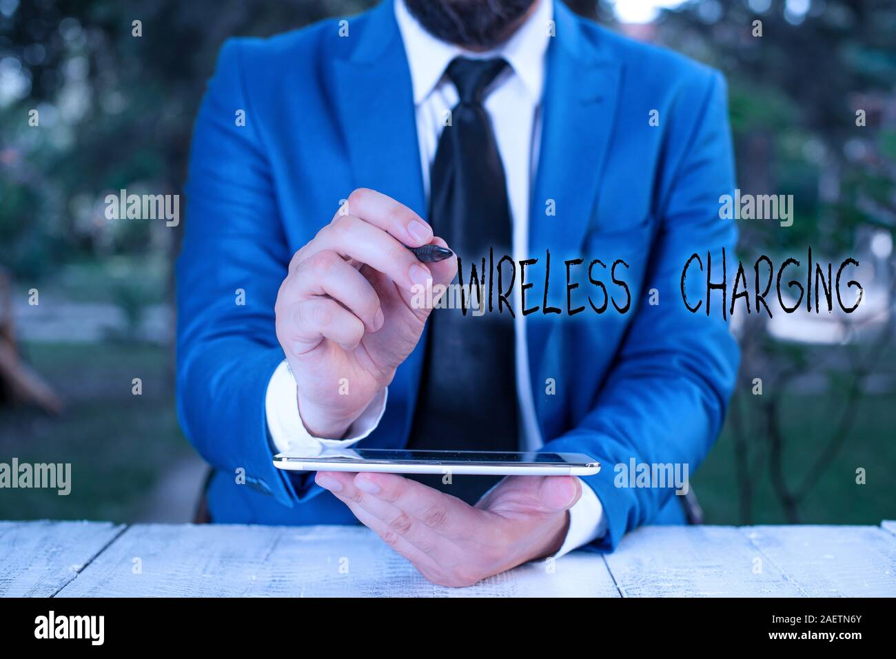 Writing note showing Wireless Charging. Business concept for methods of ...