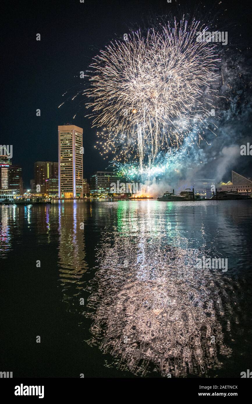 Colorful fireworks light up the night sky over Baltimore's inner harbor ...