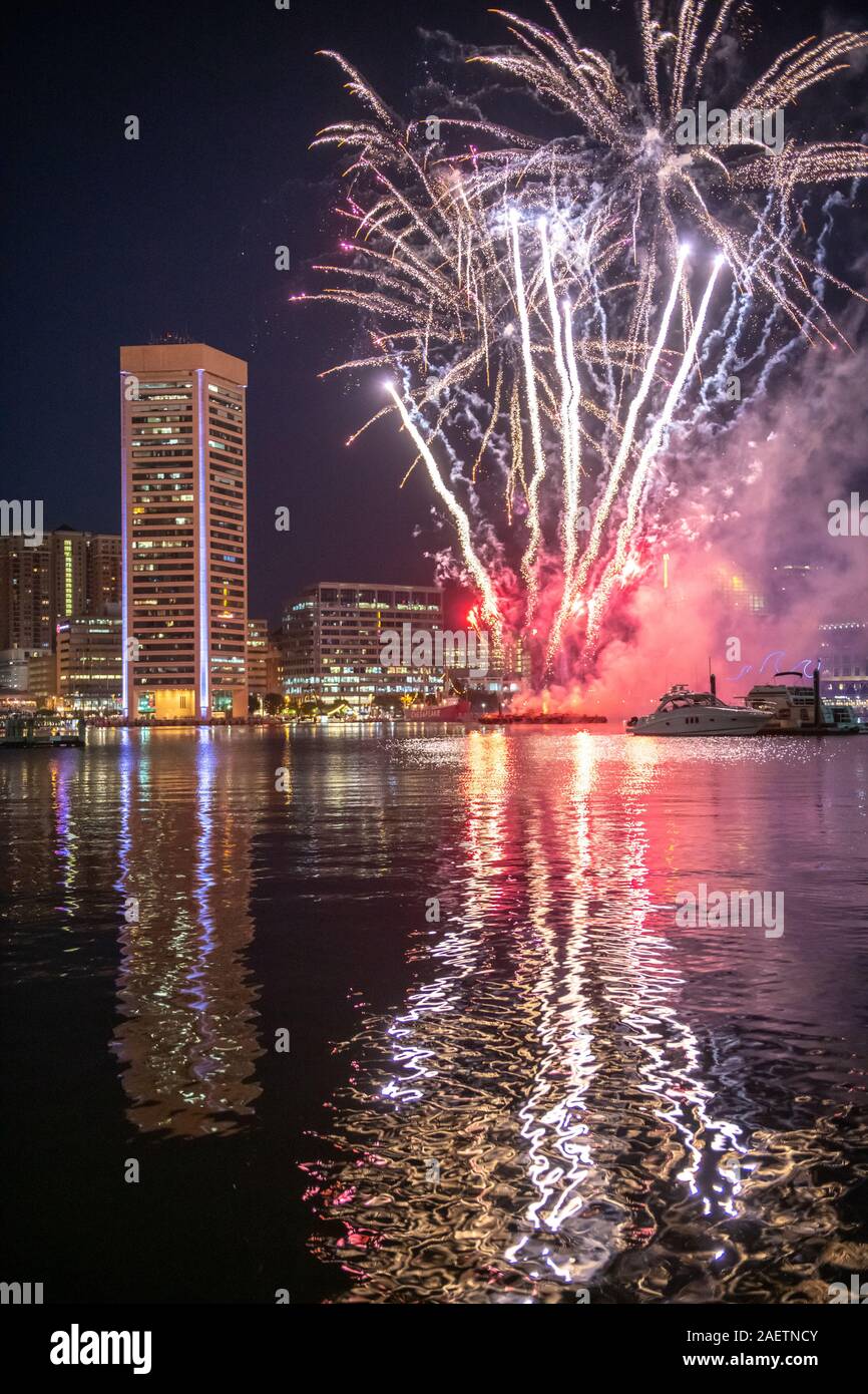 Colorful fireworks light up the night sky over Baltimore's inner harbor ...