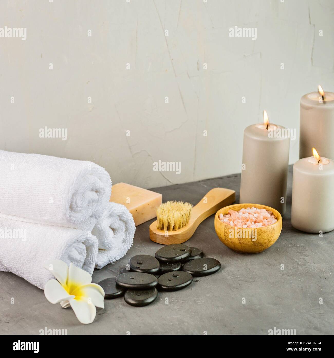 Top view of hot spa stones set for massage treatment and bamboo on ...