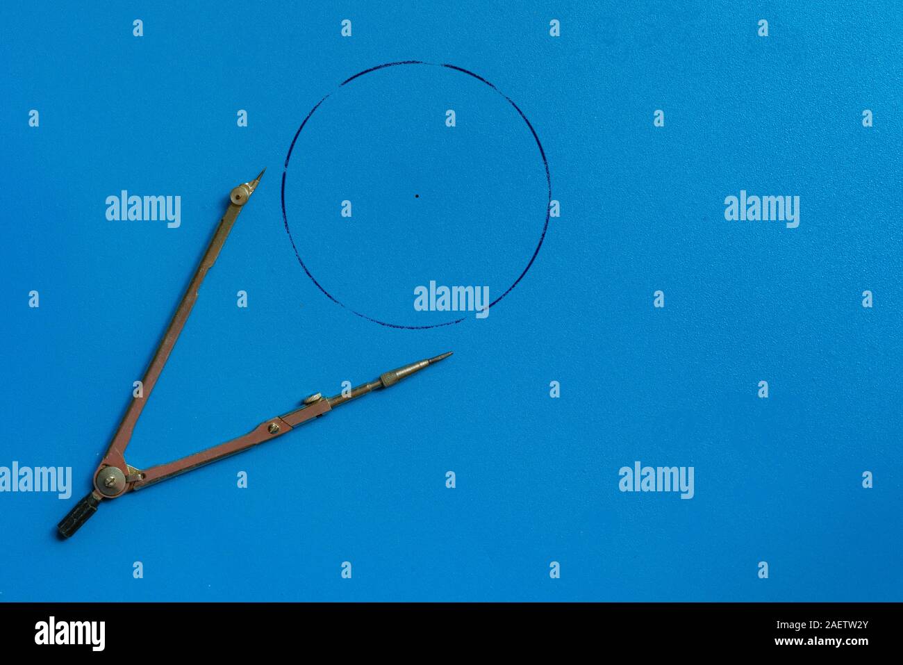 the top view of the pair of compasses on the surface to make a sketch ...