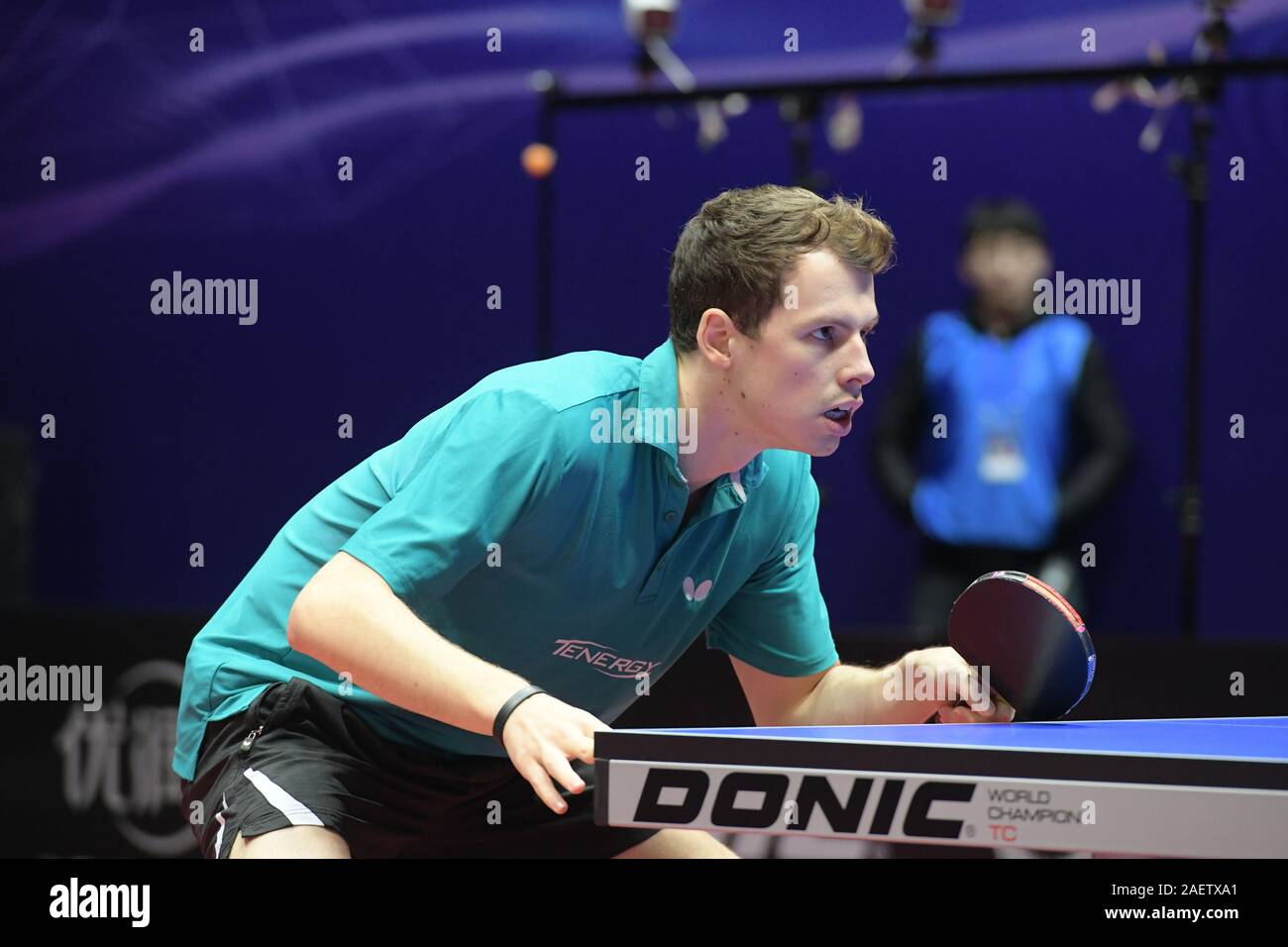 Jonathan Groth of Denmark is in action against Sathiyan Gnanasekaran of ...