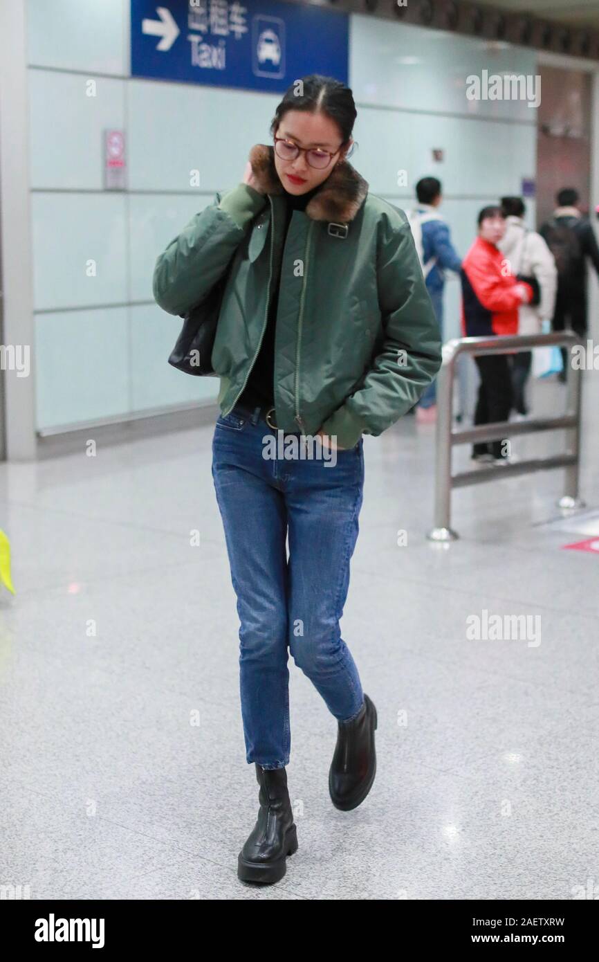 Chinese supermodel Liu Wen arrives at a Beijing airport after landing ...