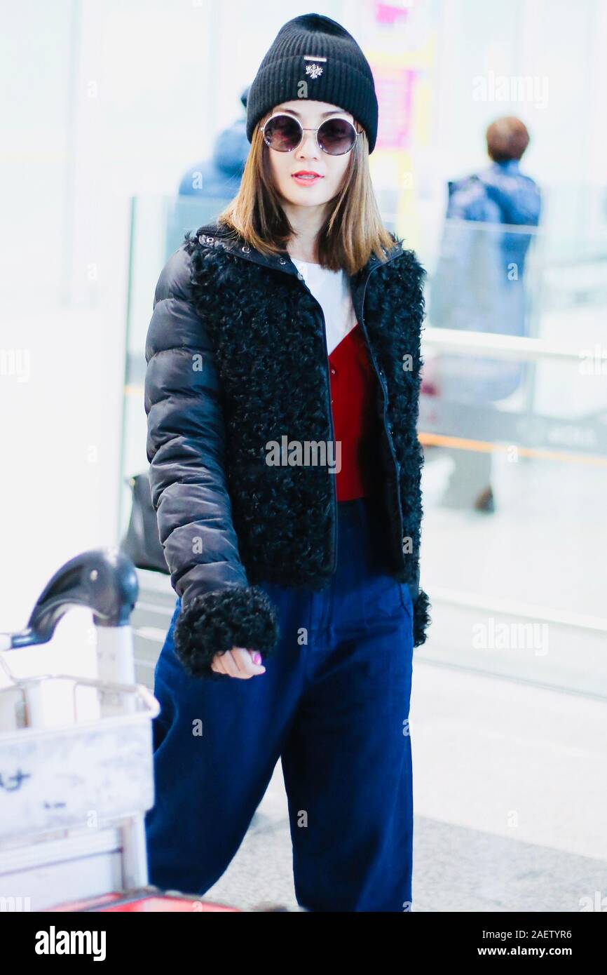 Hong Kong-Canadian actress and singer Charlene Choi arrives at a Beijing airport before ...