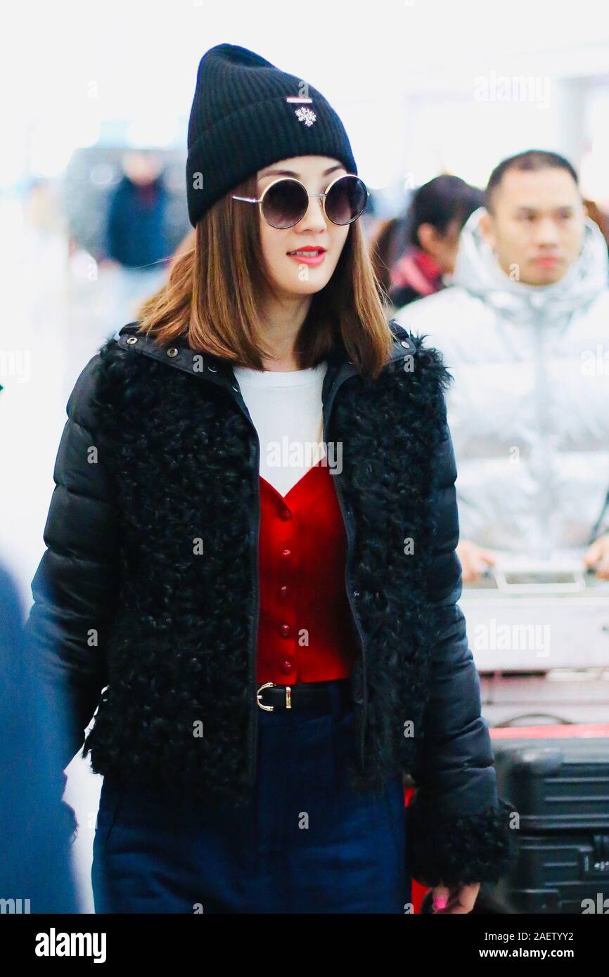 Hong Kong-Canadian actress and singer Charlene Choi arrives at a Beijing airport before ...
