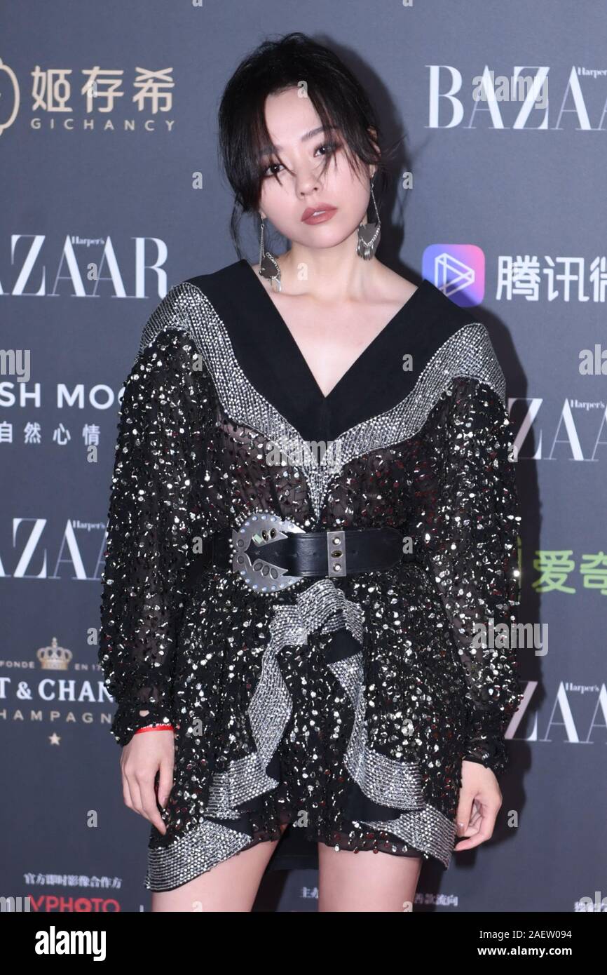 Chinese singer Zhang Liangying attends the 2019 BAZAAR Charity Night in ...