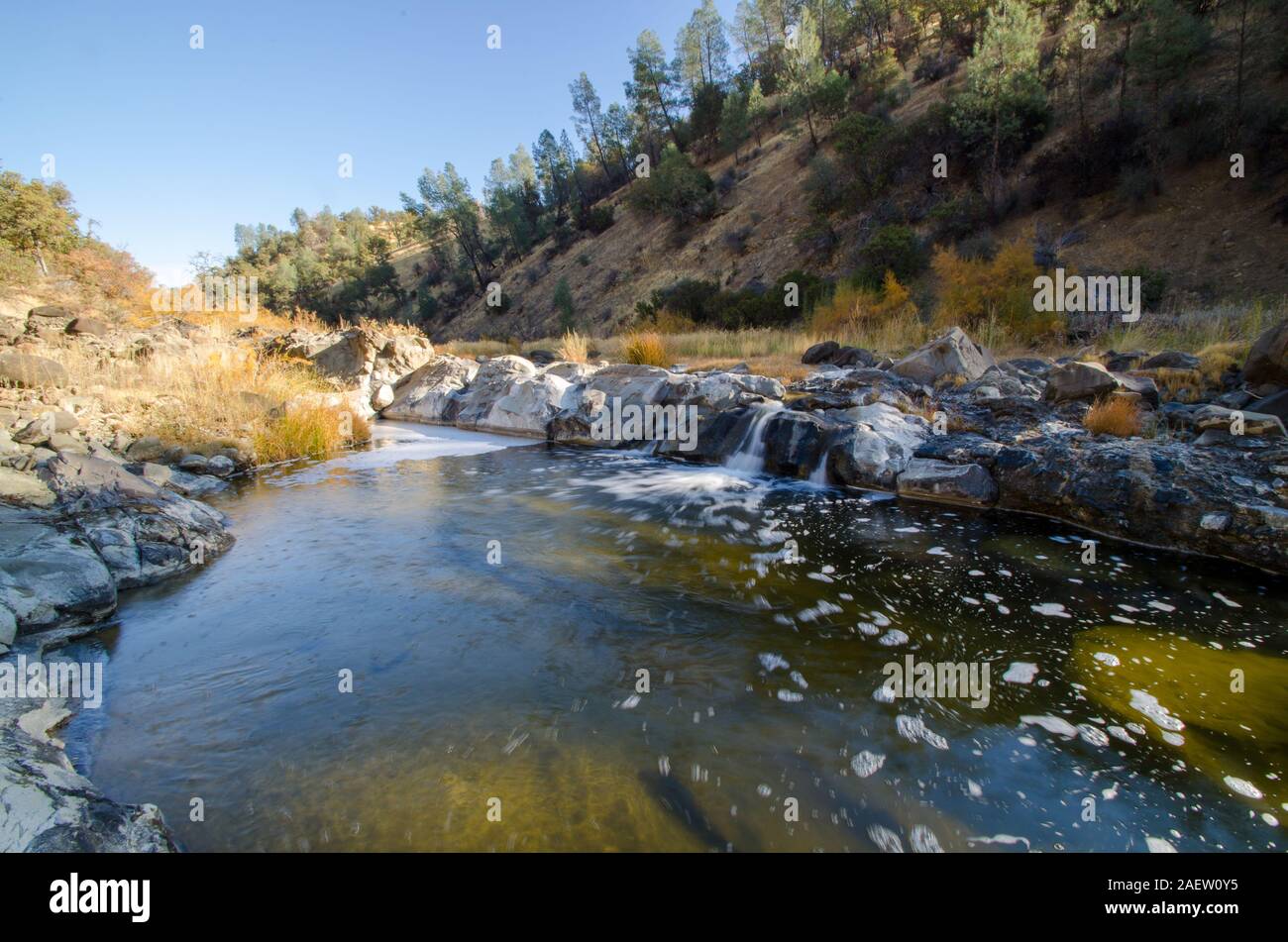 River creek waterfall over rocks forest Stock Photo - Alamy