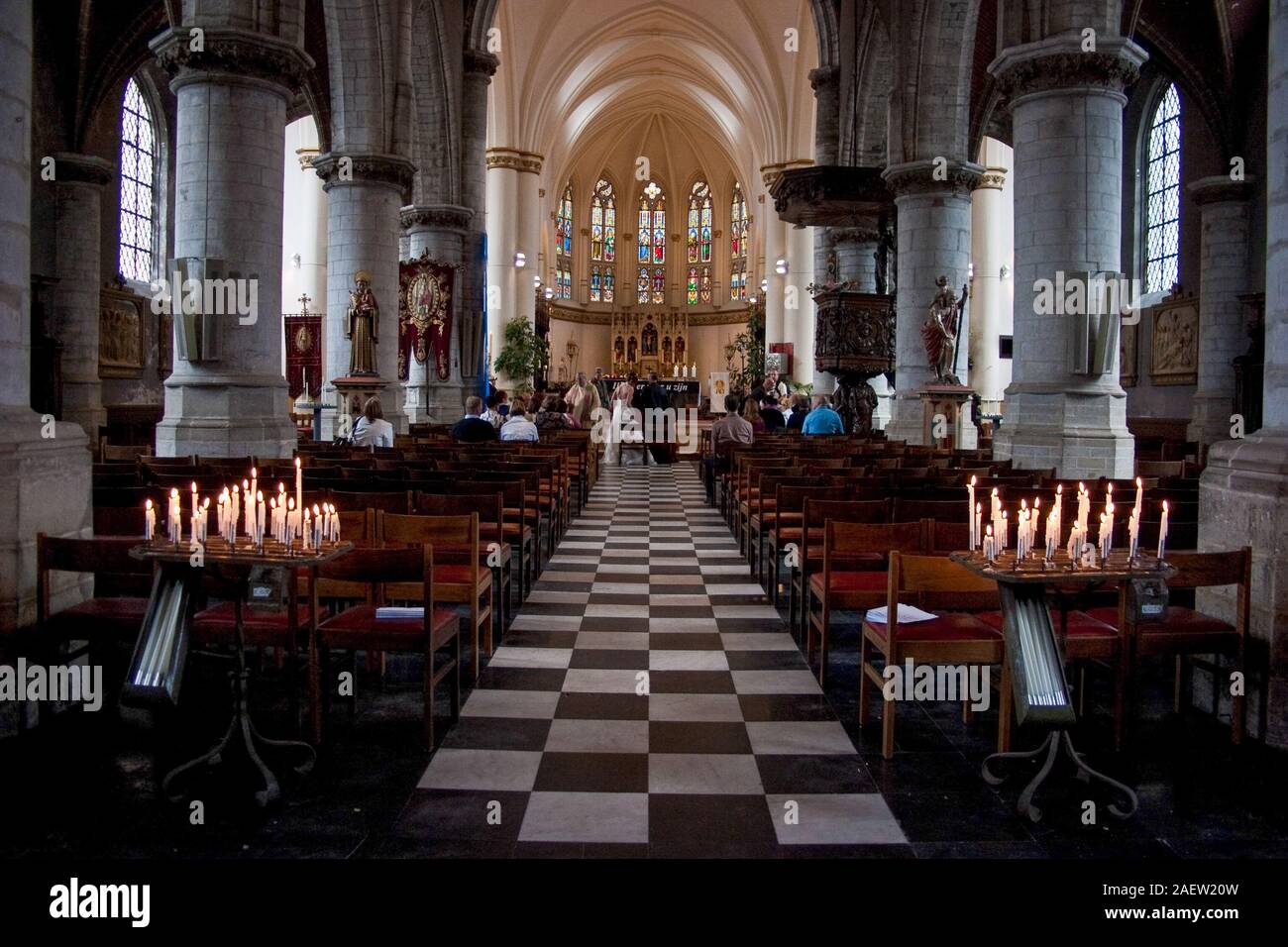 Large European Belgian Church Interior with chairs and altar and ...