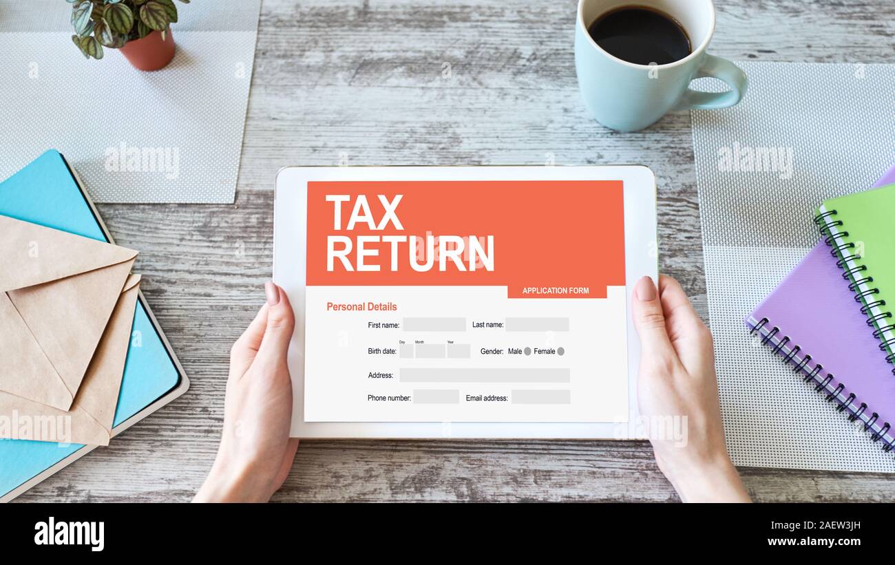 Online tax return application on screen. Business and finance concept ...