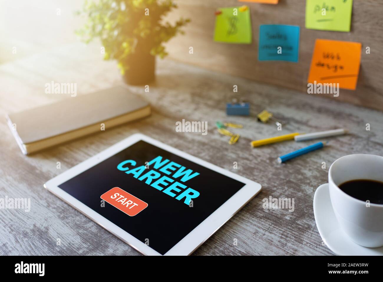Start new career button on device screen. Recruitment and personal ...