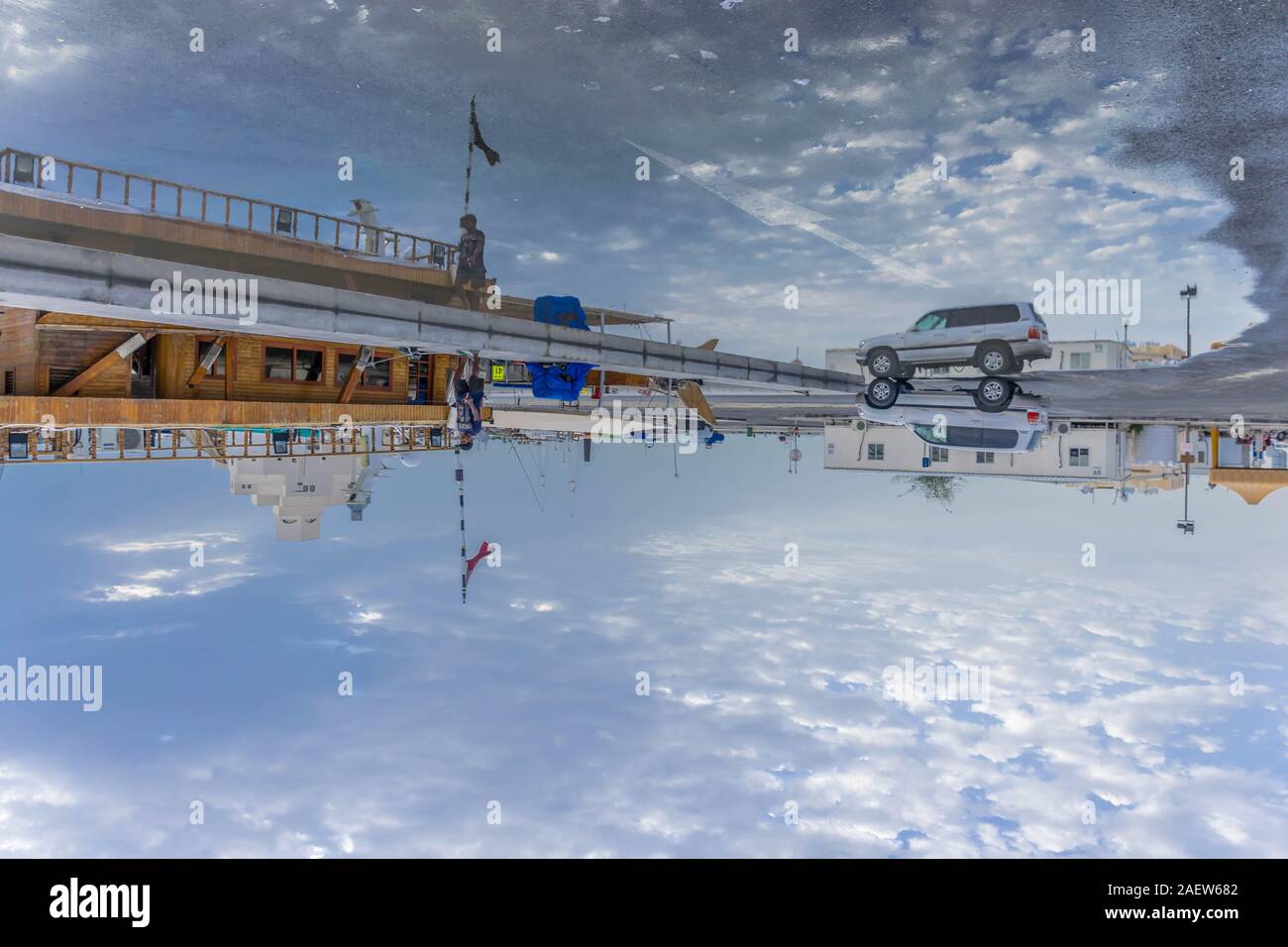 Reflection of a Car in water after rain Stock Photo - Alamy