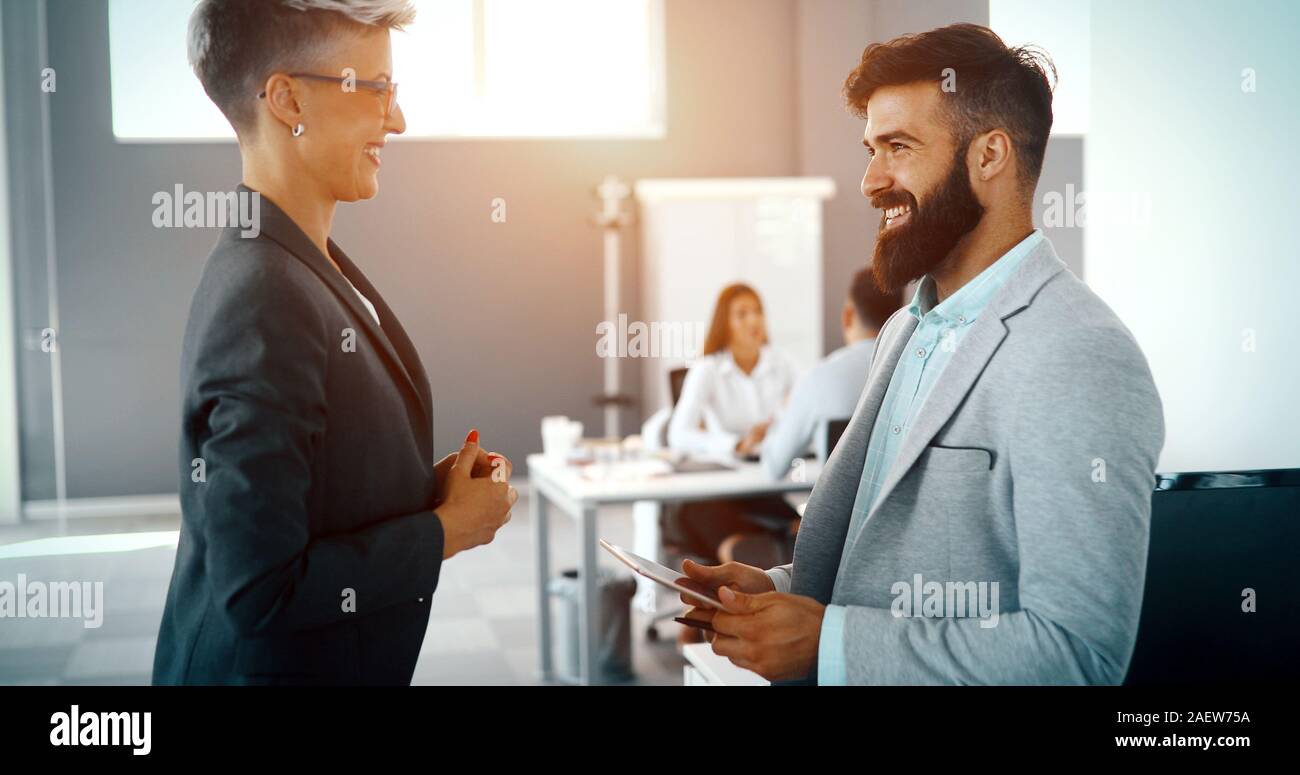 Business colleagues having conversation during coffee break Stock Photo ...