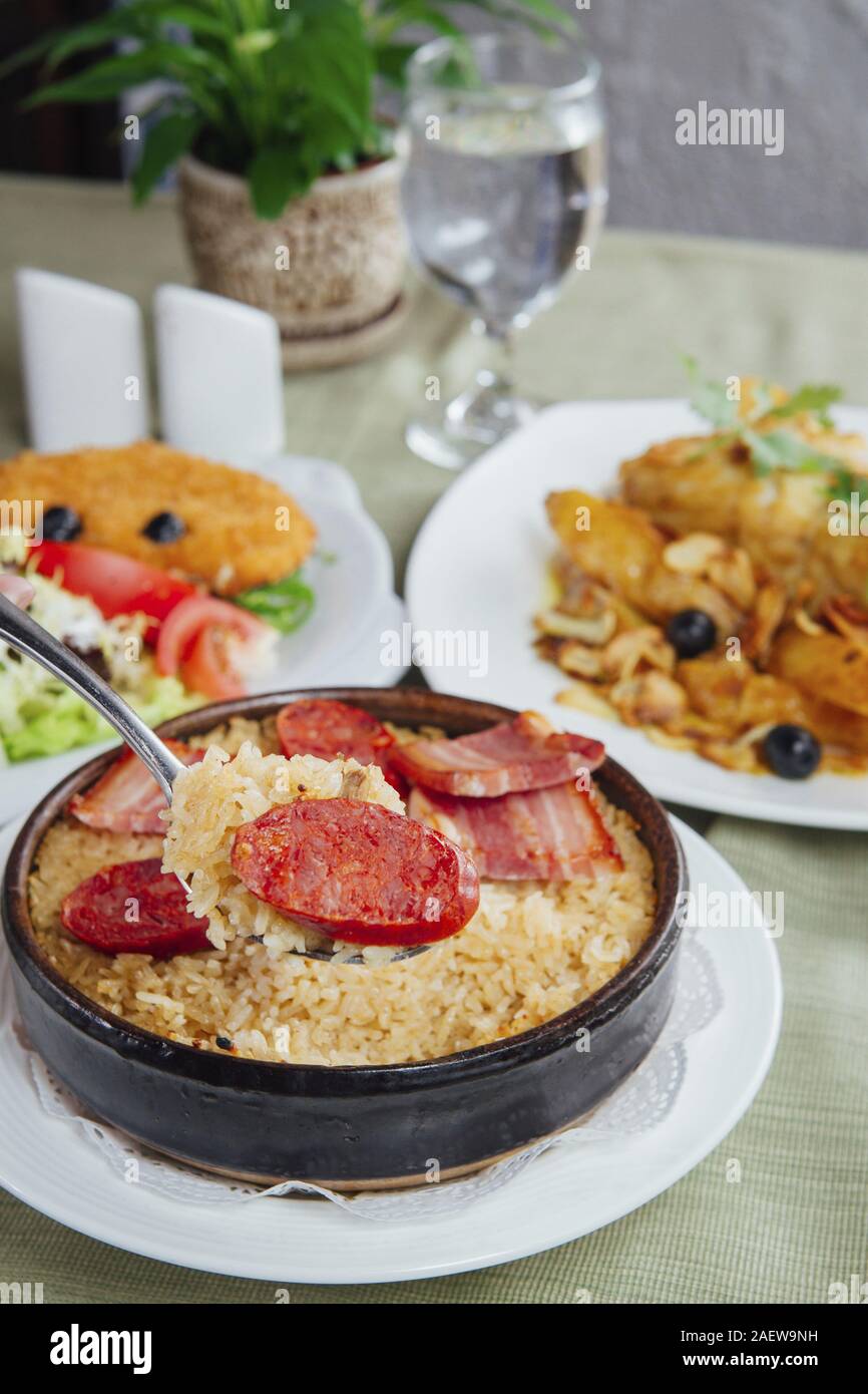 cook rice in hot pot Stock Photo - Alamy