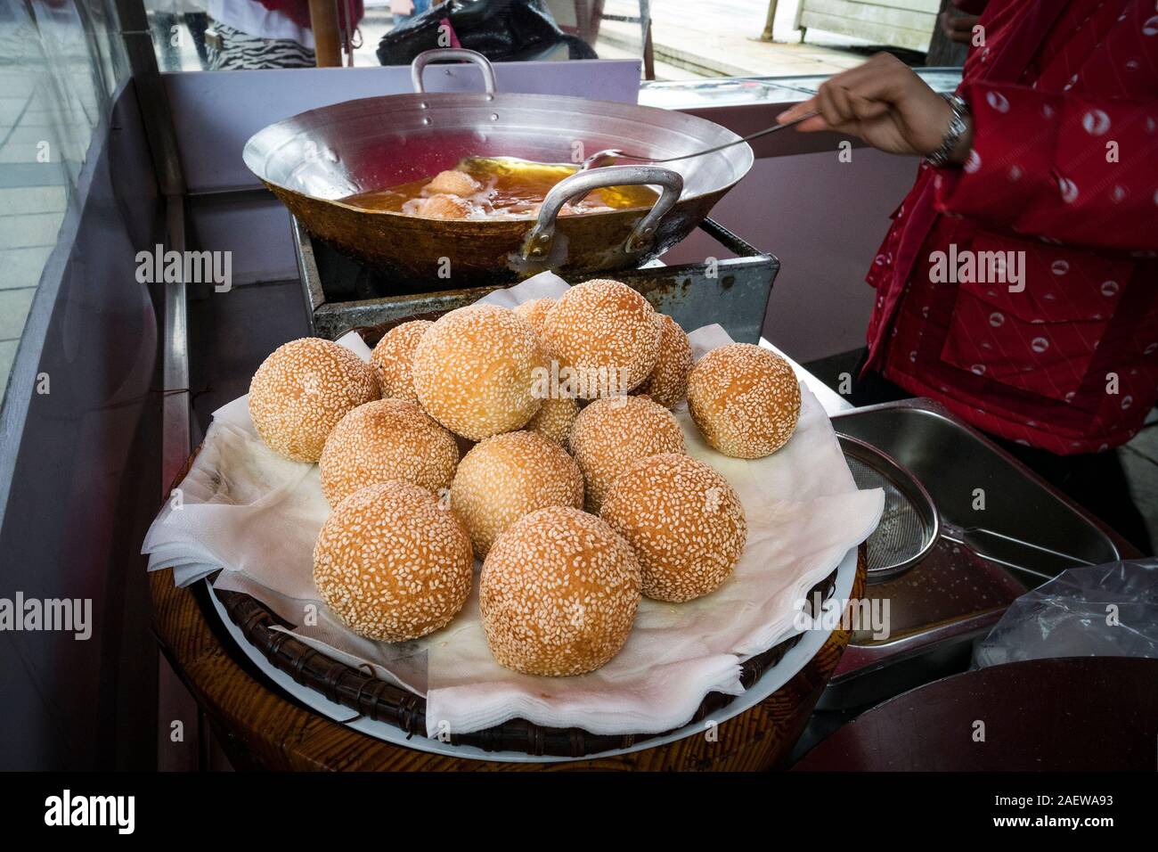 Vietnamese traditional Orange Cake, a fried ball of glutinous rice ...
