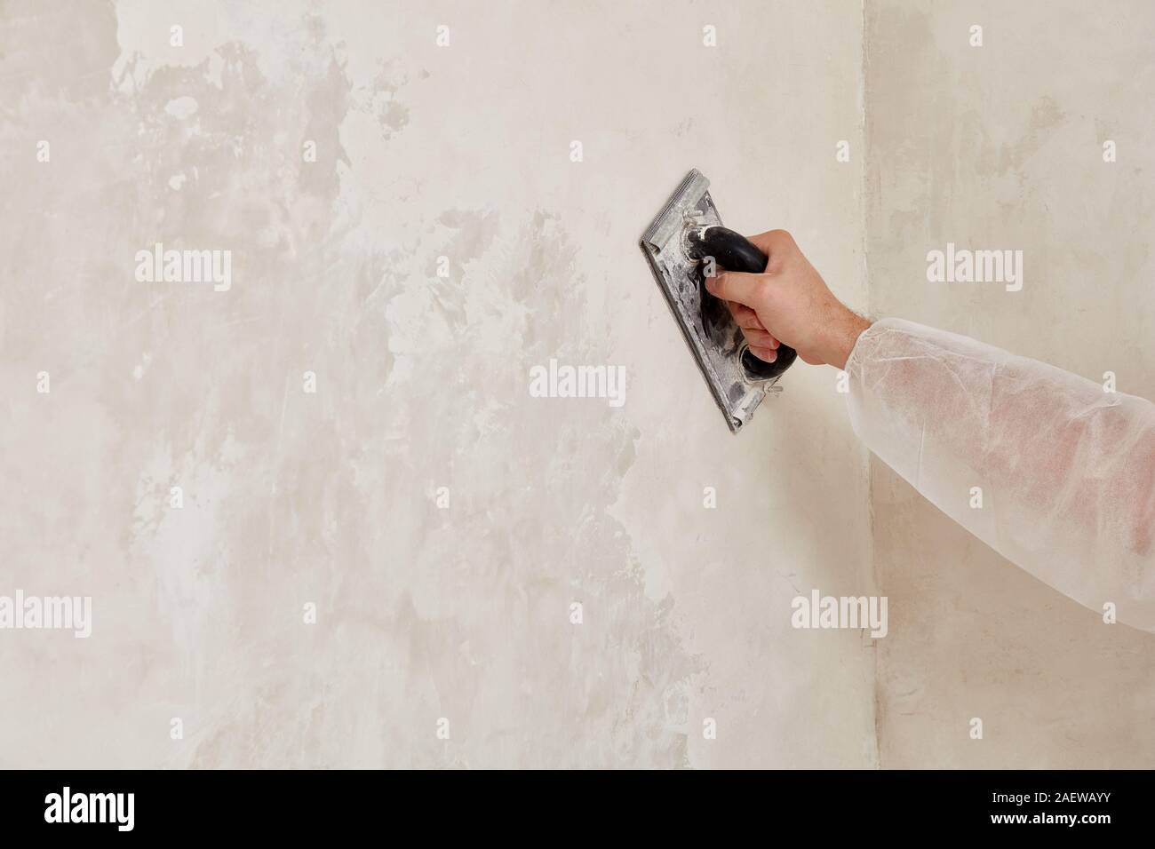 Worker after sanding wall hi-res stock photography and images - Alamy