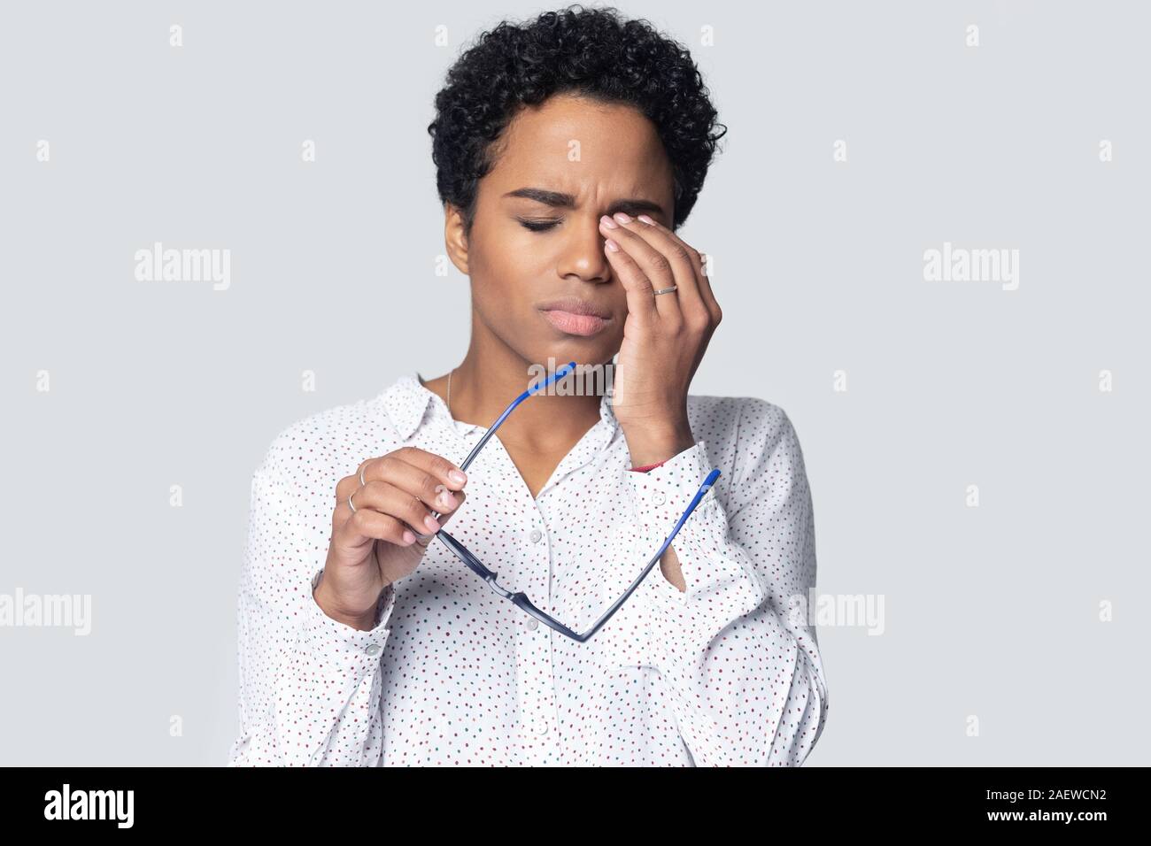 Rubbing eyelids hi-res stock photography and images - Alamy