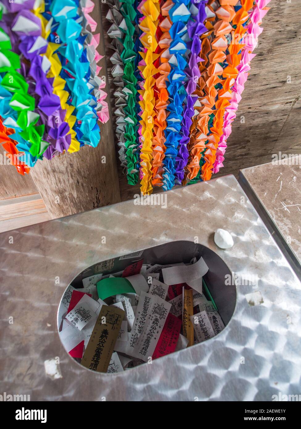 With origami crane offerings hi-res stock photography and images - Alamy