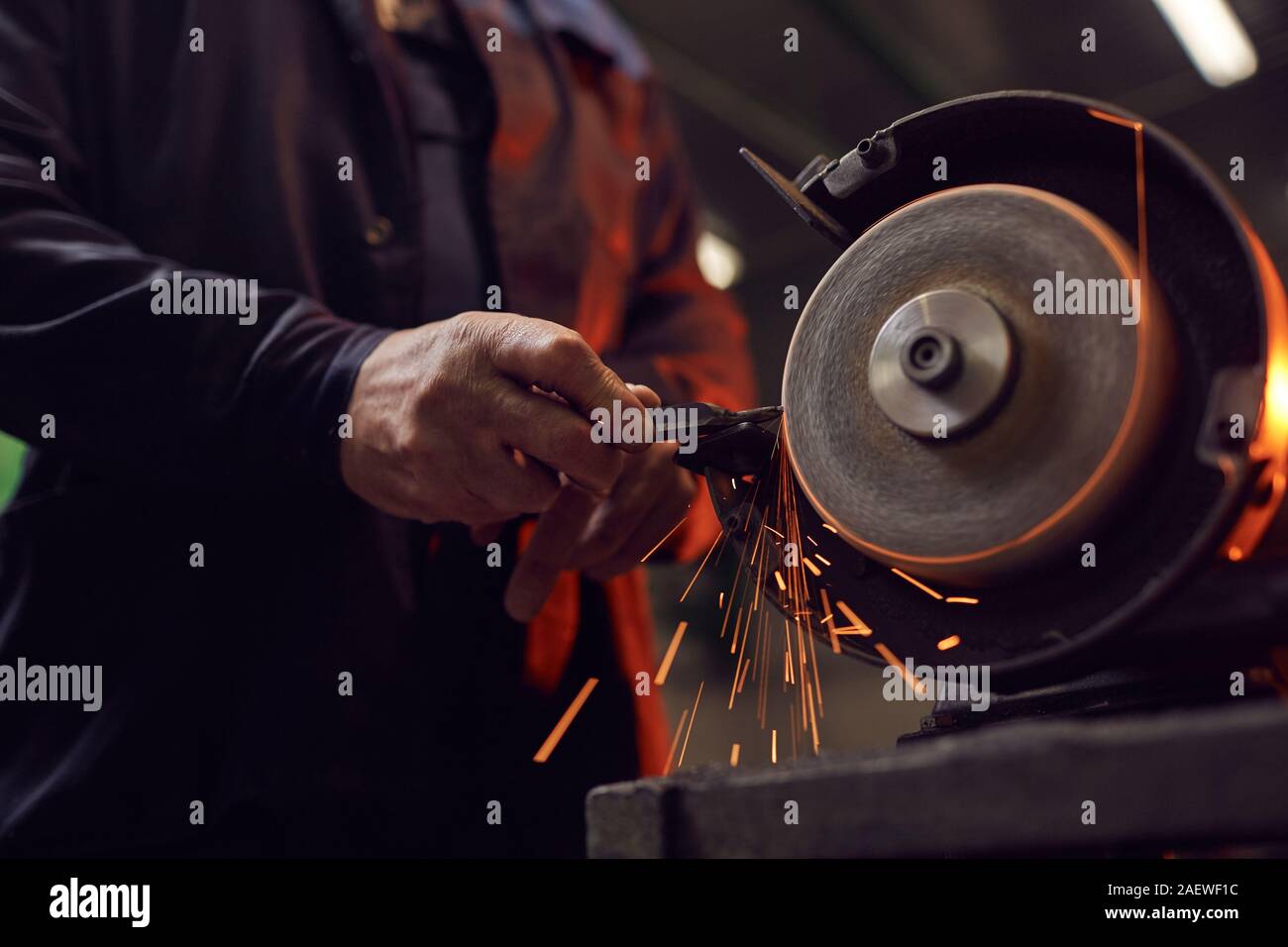 Worker grinding metal detail close hi-res stock photography and images ...
