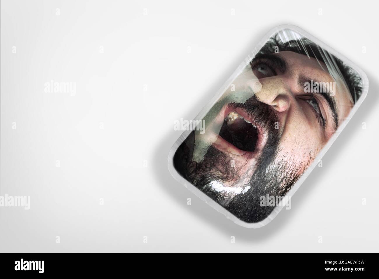 Dead. Human head as a goods in plastic box on white background, ecology ...