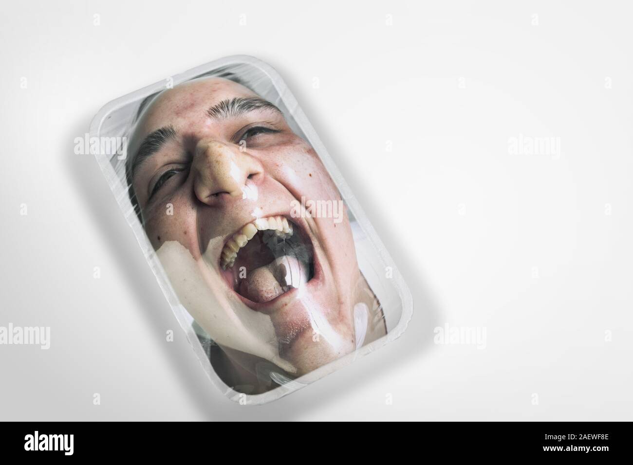 Nightmare. Human head as a goods in plastic box on white background ...
