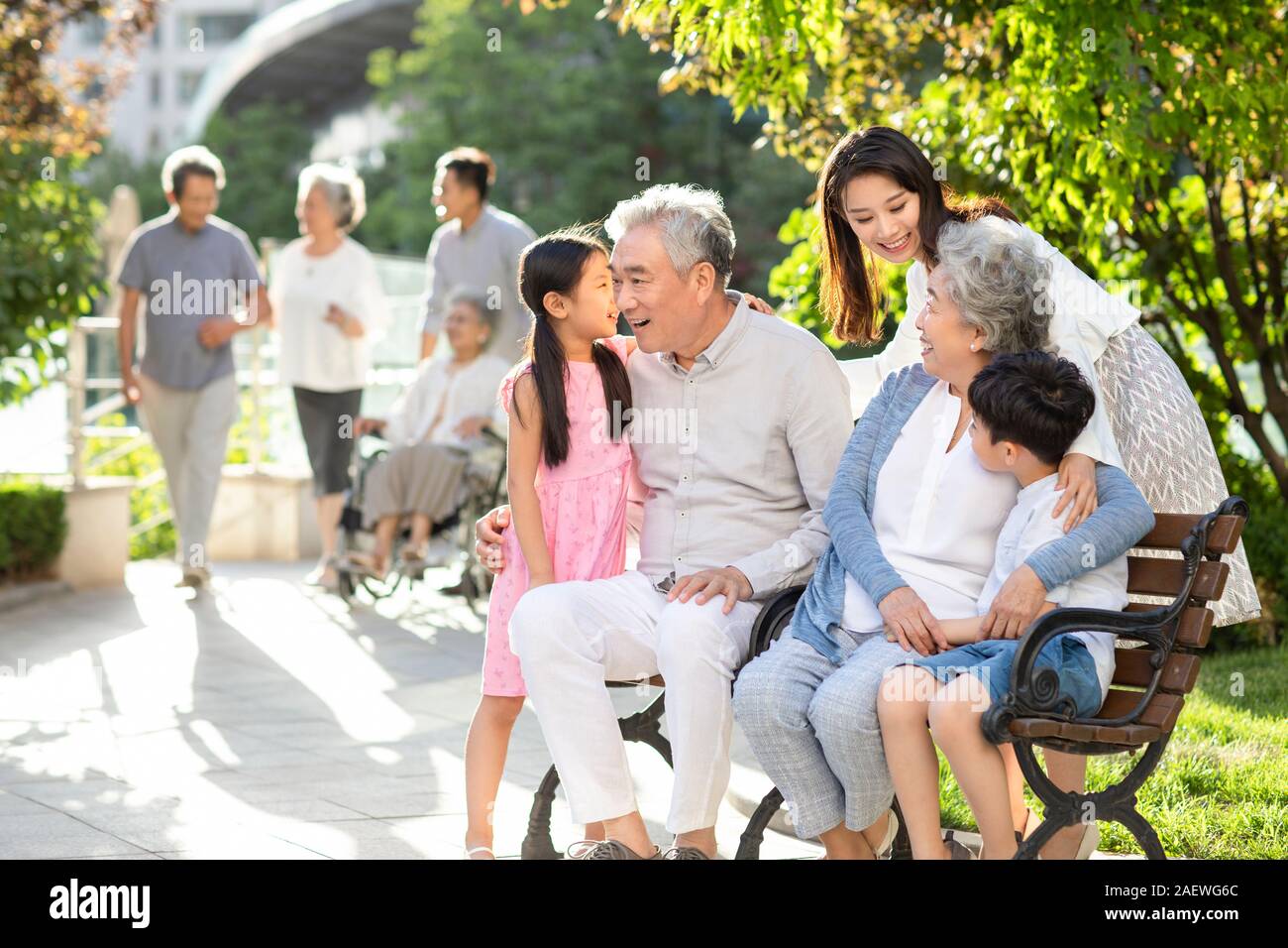 Happy family relaxing in nursing home Stock Photo - Alamy