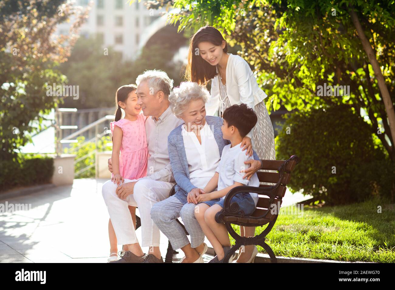 Happy family relaxing in nursing home Stock Photo - Alamy