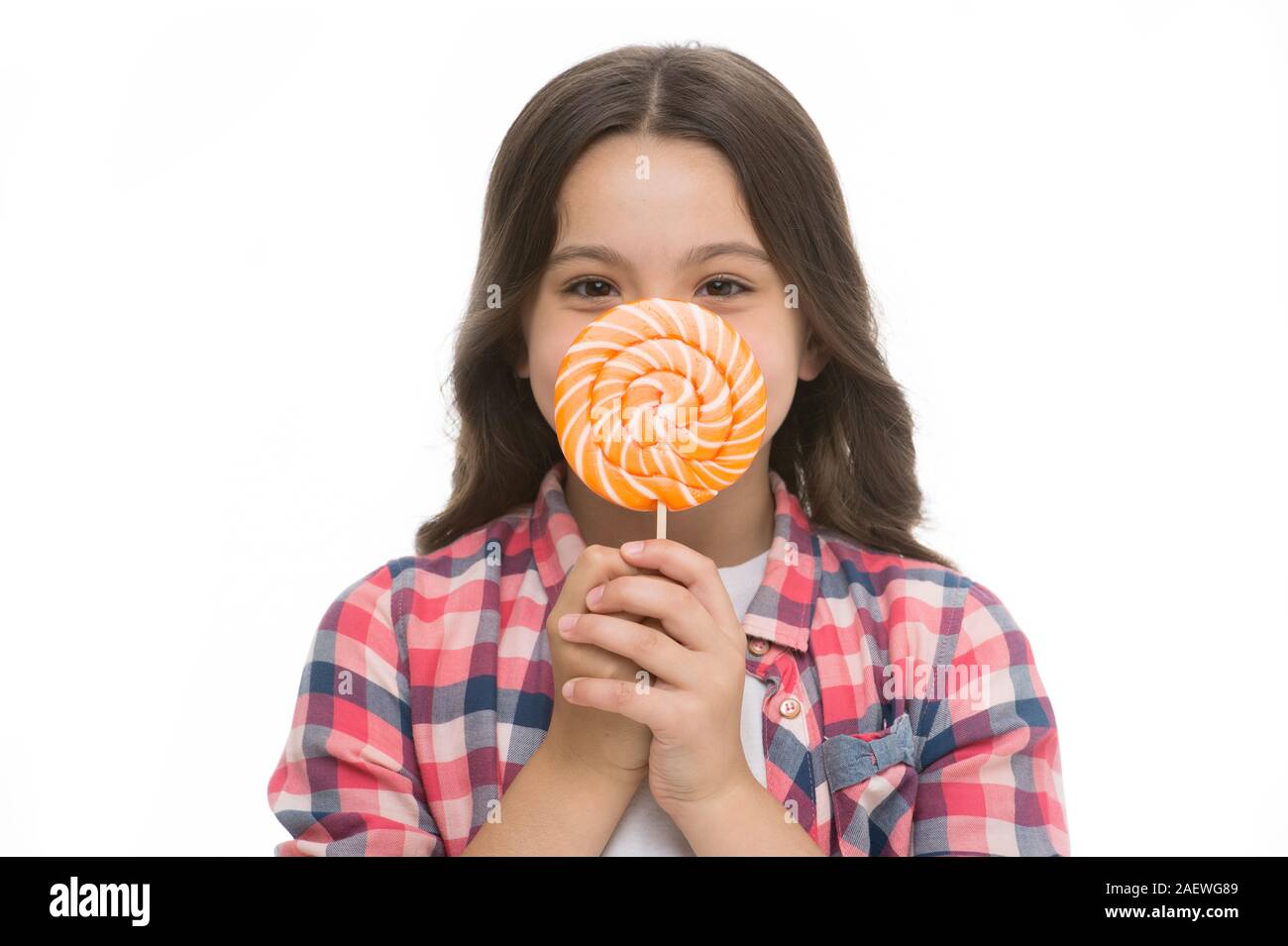 She can not live without sweets. Girl cute smiling face holds sweet ...
