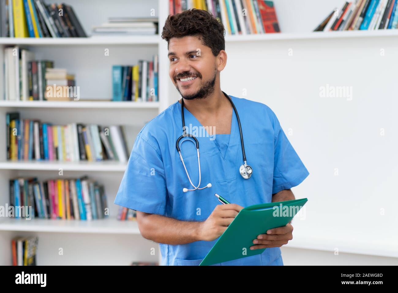 Laughing latin american doctor at work at hospital Stock Photo - Alamy