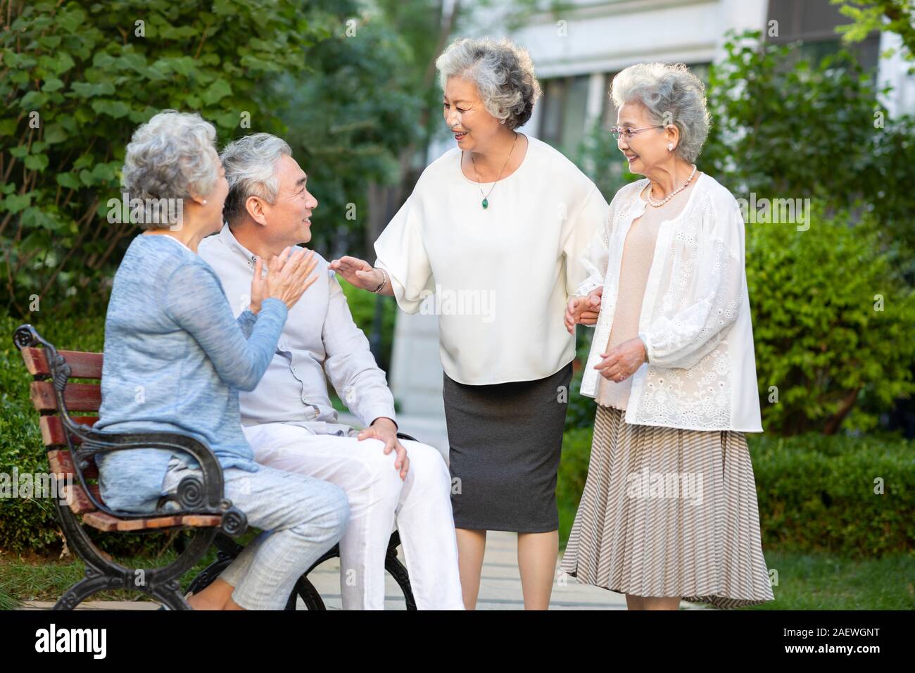Senior friends talking in nursing home Stock Photo - Alamy