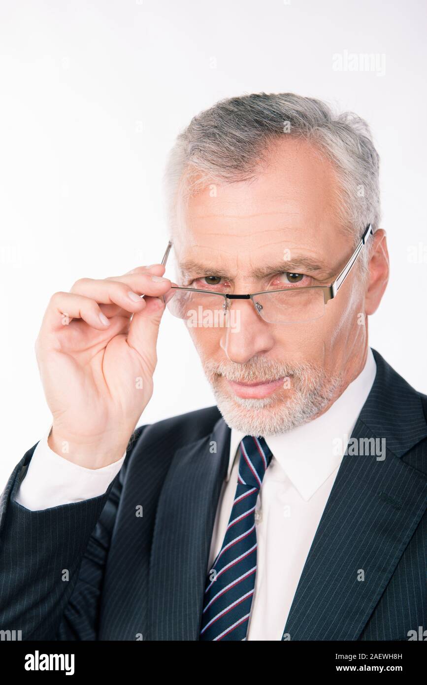 handsome intelligent old man in business suit holding glasses and ...