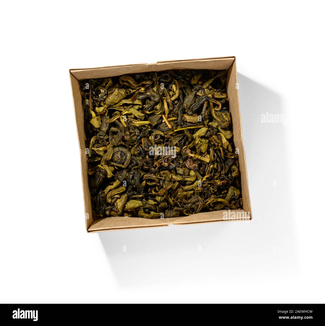 Green tea top view on white background Stock Photo - Alamy