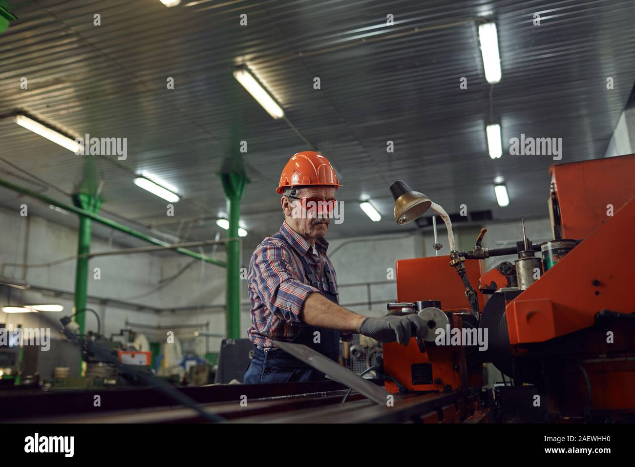 Place of work technology manual worker standing working operating ...