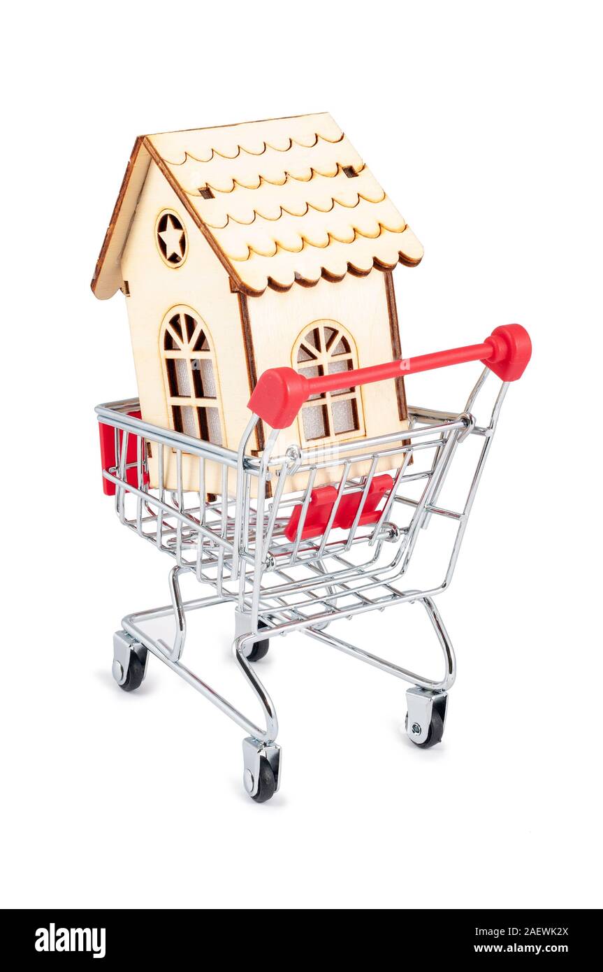 New house in shopping cart isolated white backgroud Stock Photo - Alamy