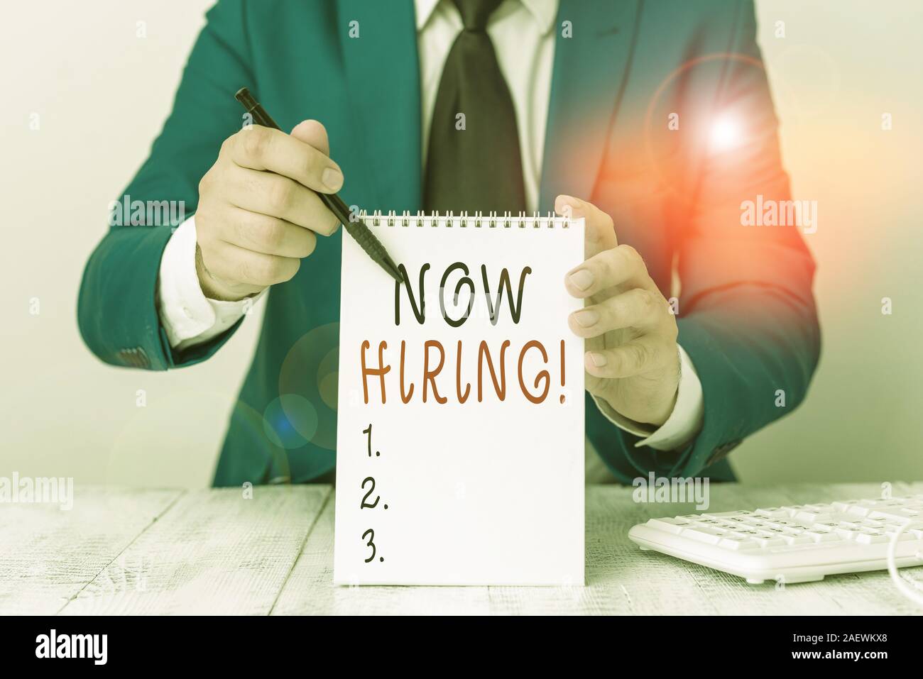 Text sign showing Now Hiring. Business photo showcasing finding ...