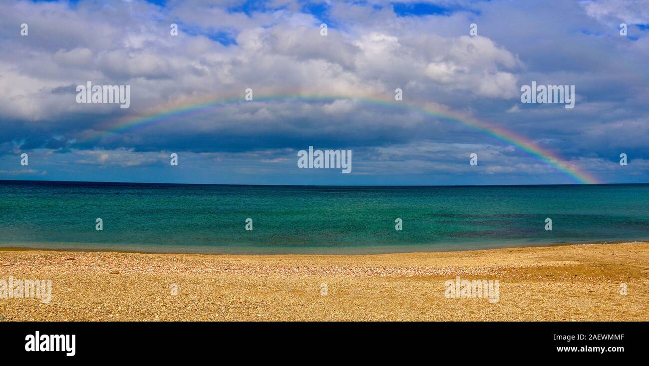 Rainbow and beach hi-res stock photography and images - Alamy
