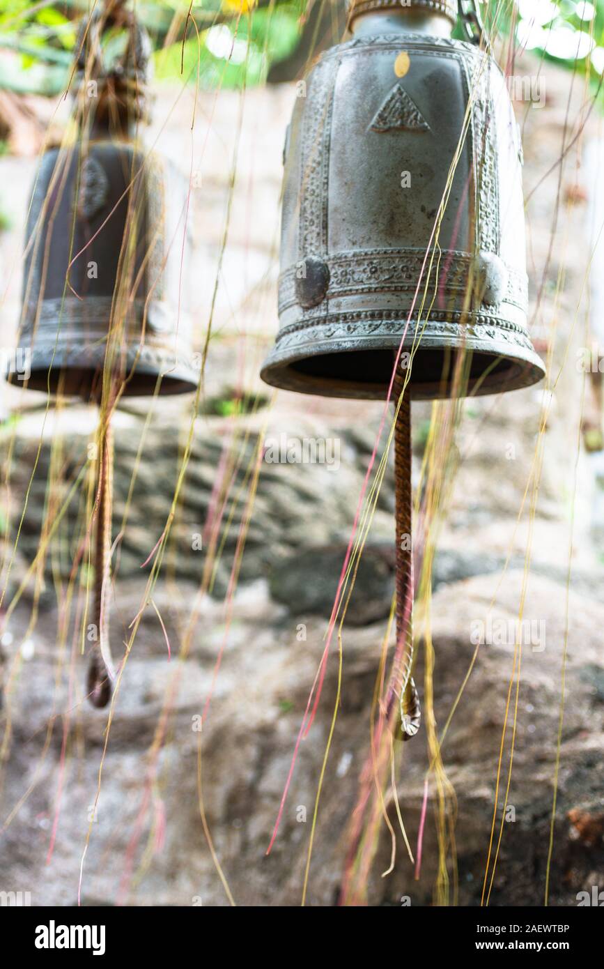 Two bells in branches of liana Golden Mountain in Bangkok. Text ...