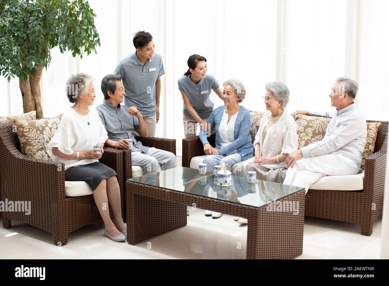 Senior friends talking in nursing home Stock Photo - Alamy