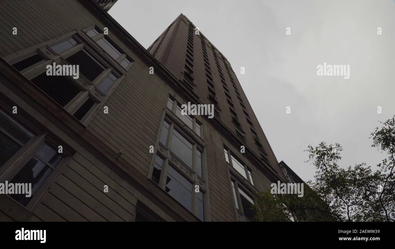 Straight up vertical view of generic apartment buildings during day ...