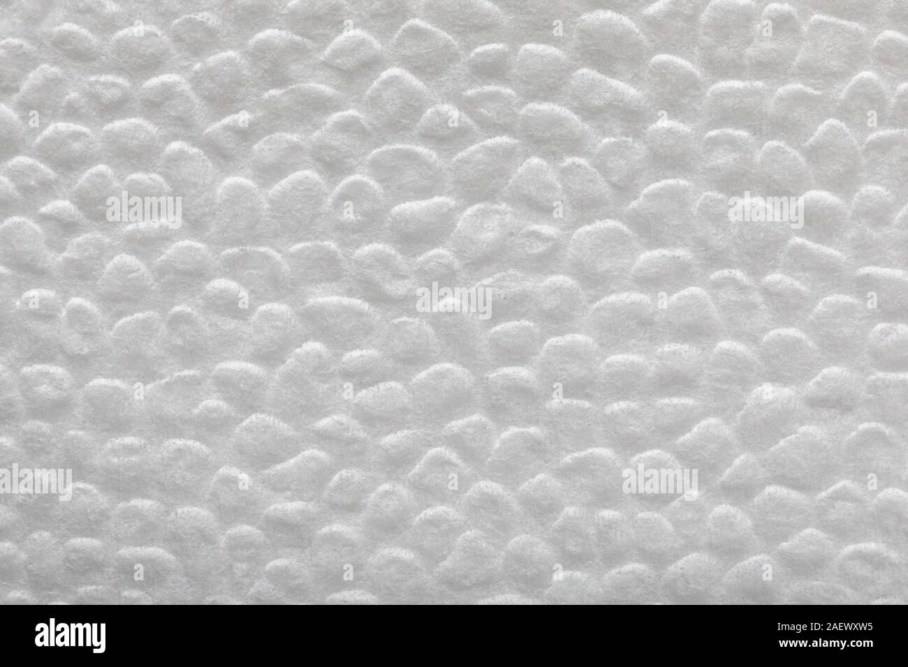 white embossed paper surface matte background. closeup napkin or towel ...