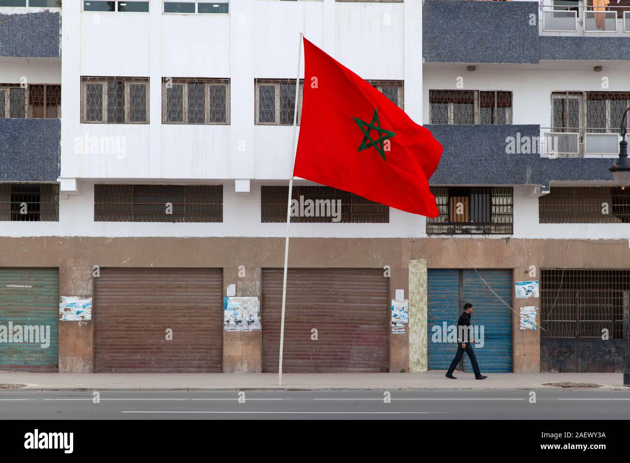 Moroccan flag waving in the street of Tangier Stock Photo - Alamy