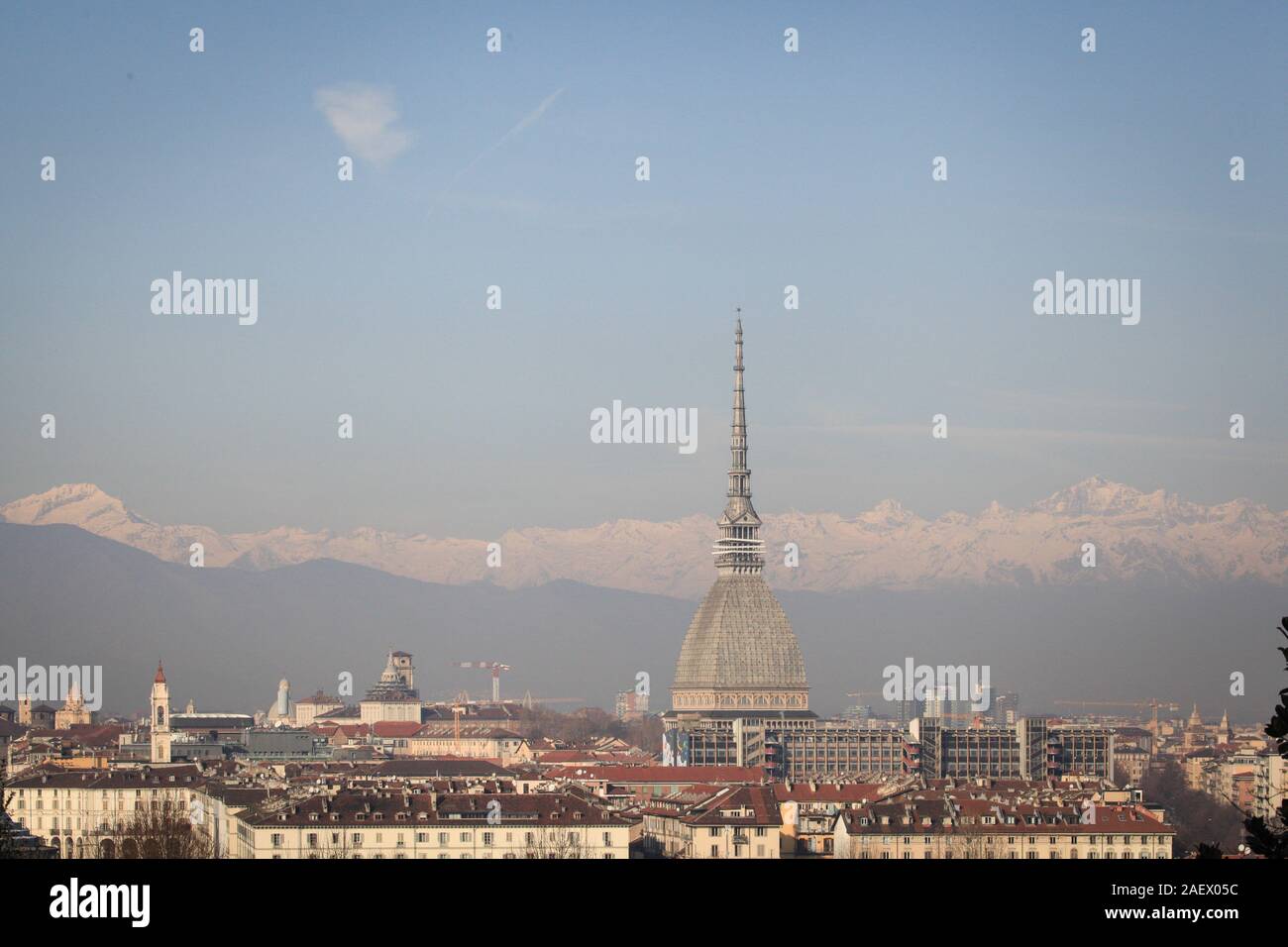Turin Alps Skyline. View Over the city with rooftops and La Mole ...